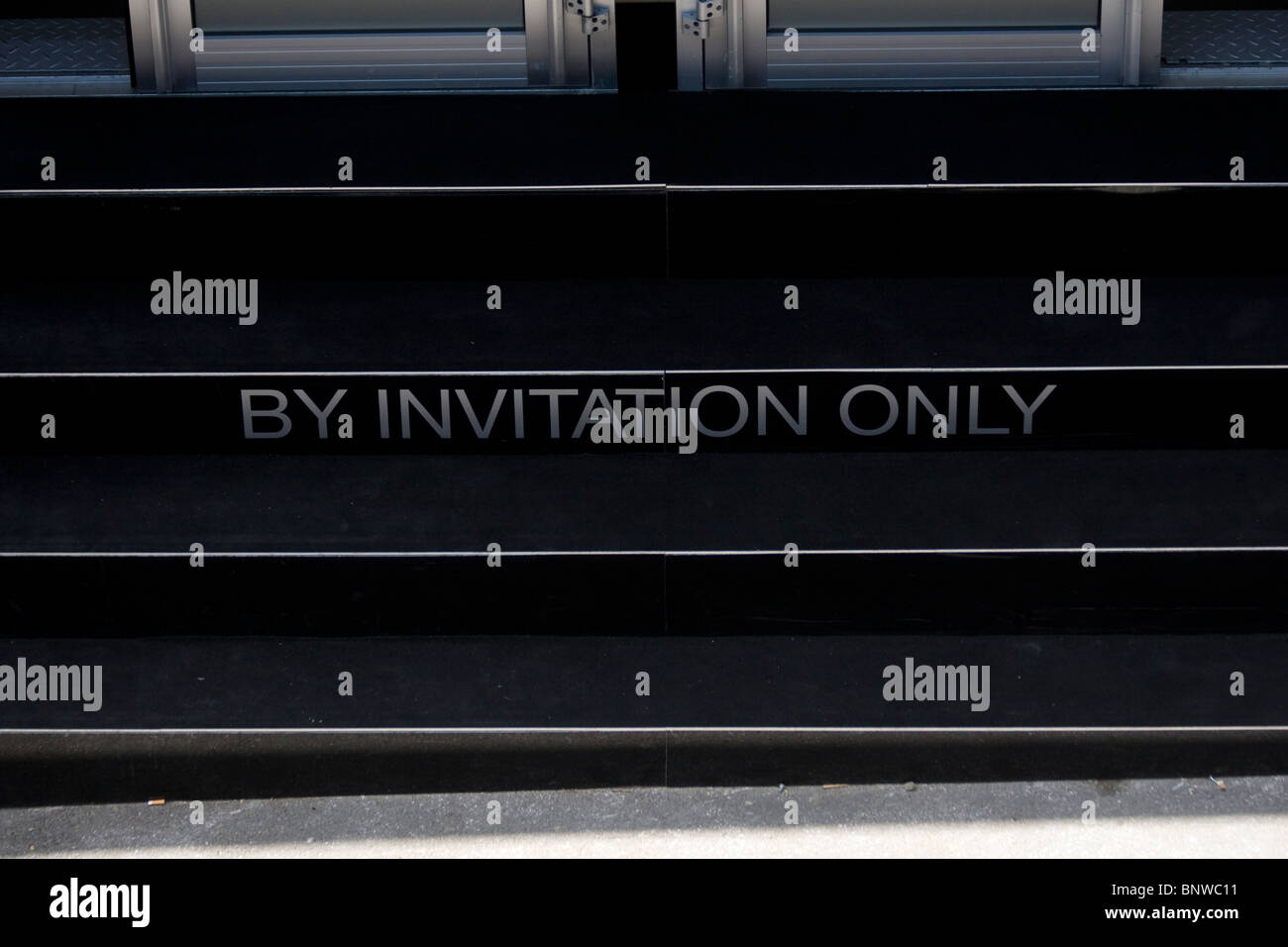 By Invitation Only SIgn on entrance steps of hospitality chalet at ...