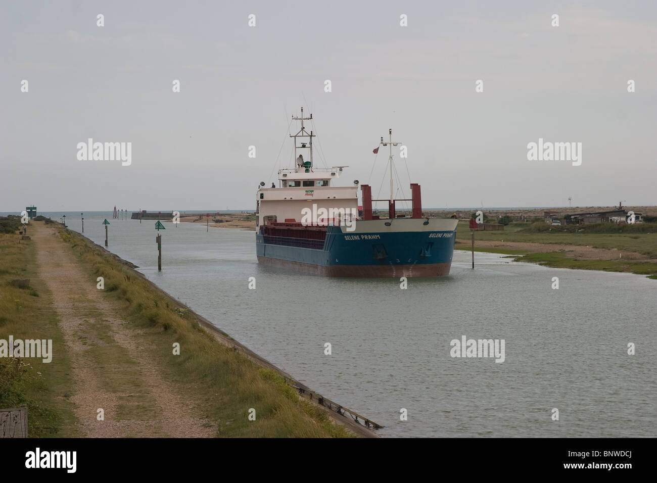 small cargo boat tanker river channel navigating Stock Photo - Alamy