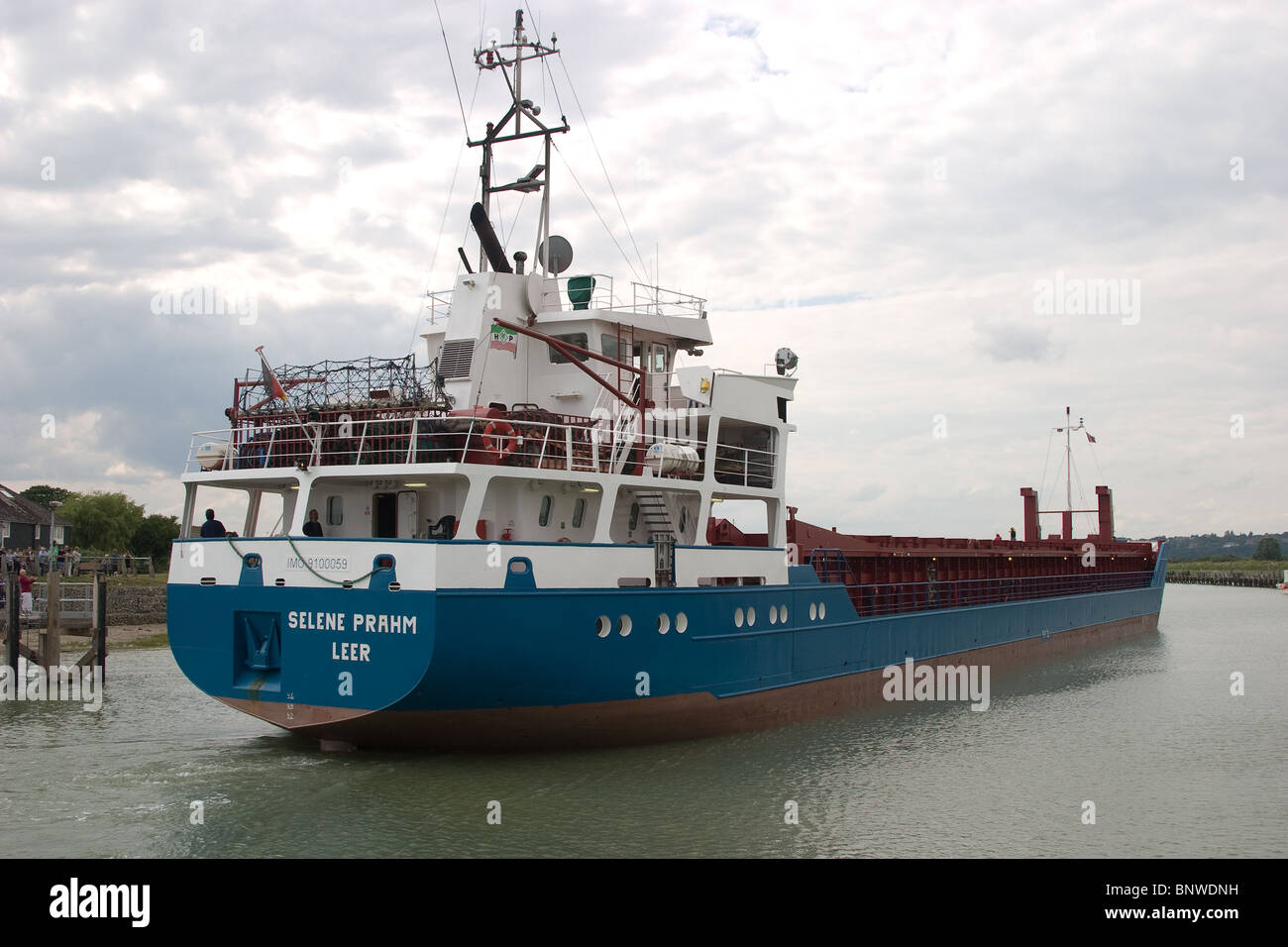 small cargo boat tanker river channel navigating Stock Photo - Alamy
