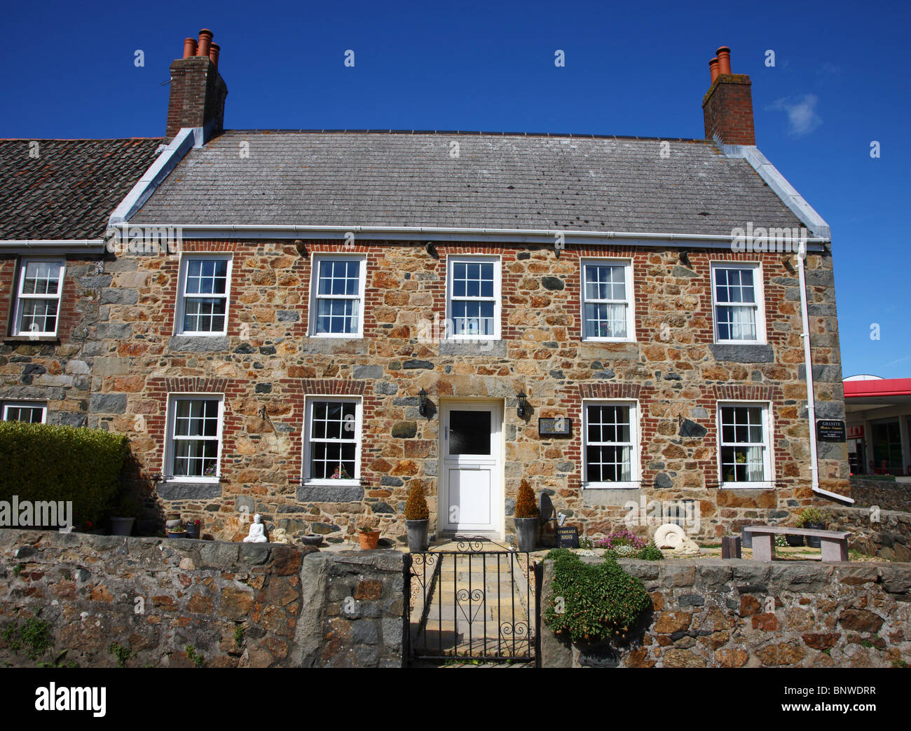 Typical stone houses, made mostly of granite, decorated with lots of ...