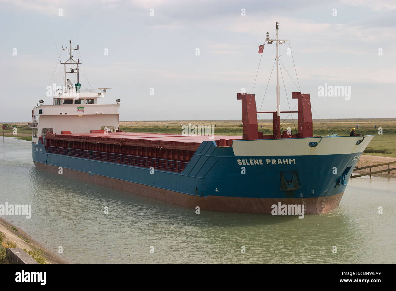 small cargo boat tanker river channel navigating Stock Photo - Alamy