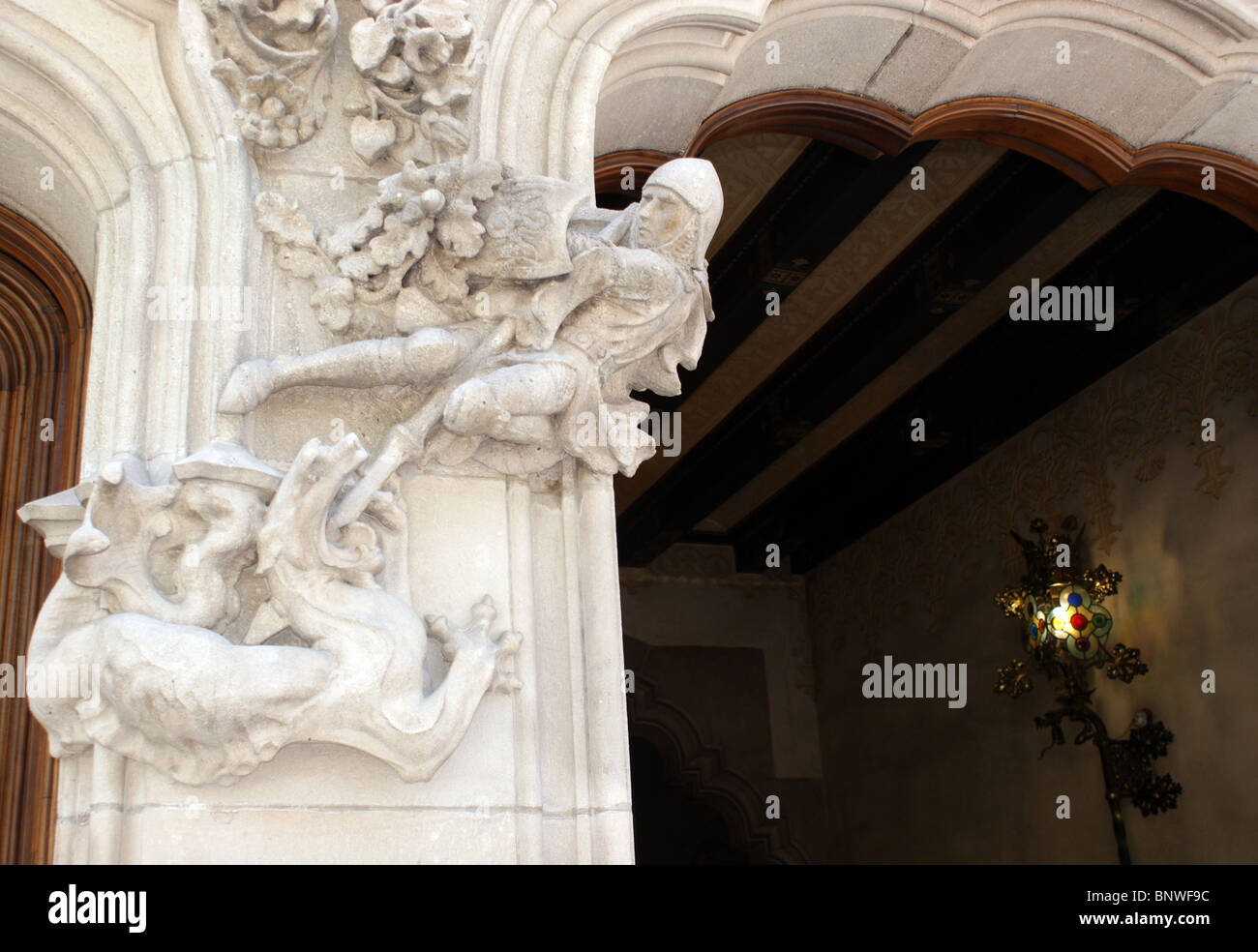 STATUE OF ST GEORGE AND THE DRAGON ON THE WALL OF A BUILDING IN ...
