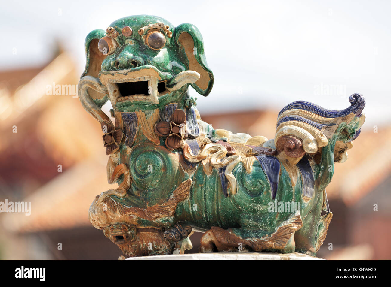 sculpture of buddhist mythology creature guarding temple entrance ...