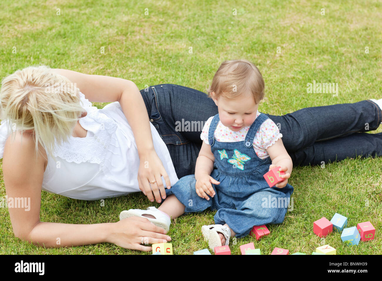 Mother looking at her cute child Stock Photo - Alamy