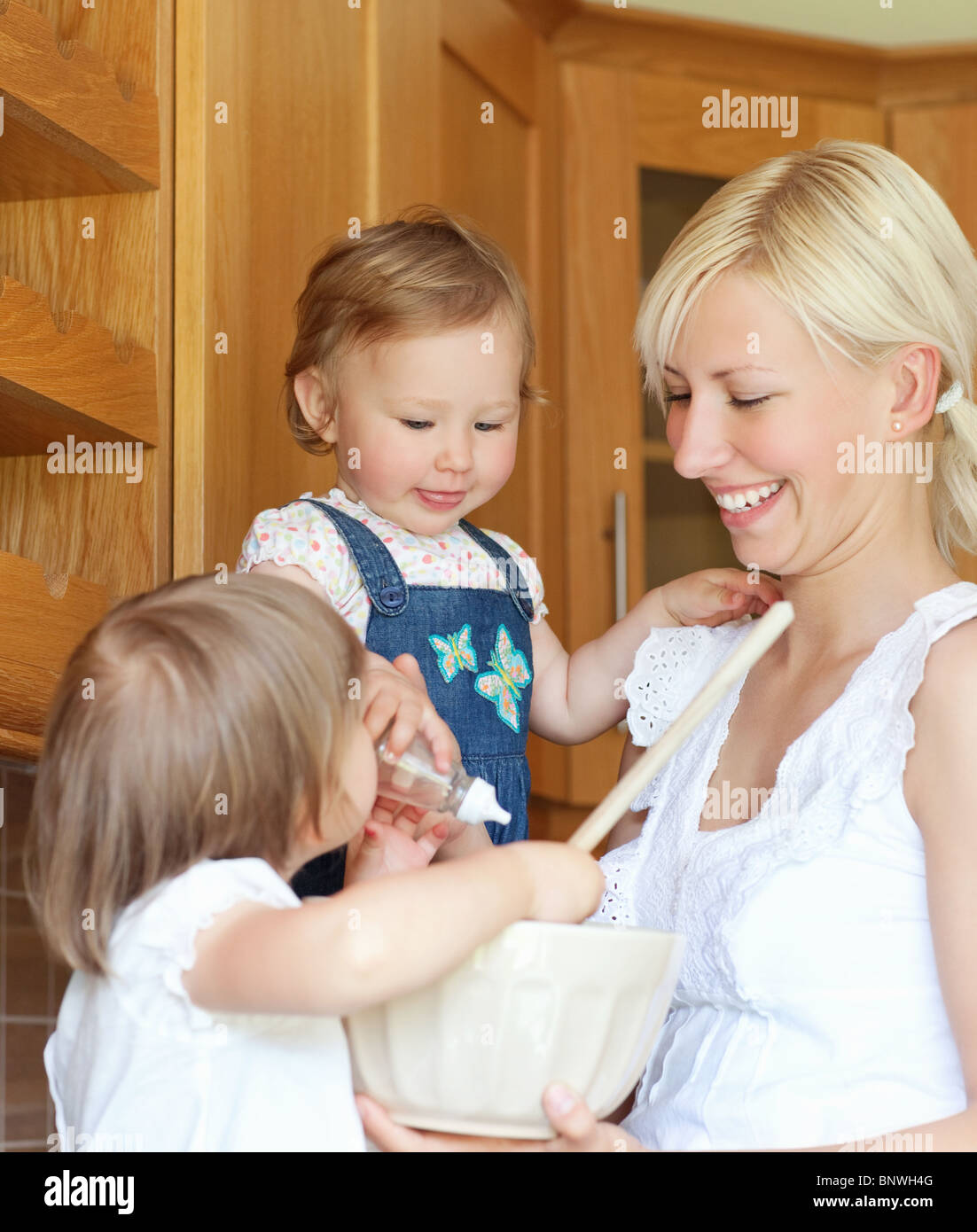 Portrait of a family cooking Stock Photo - Alamy