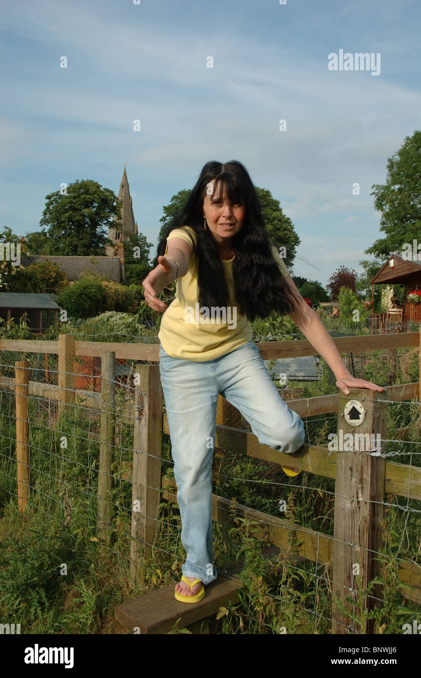 Climbing over a stile hi-res stock photography and images - Alamy