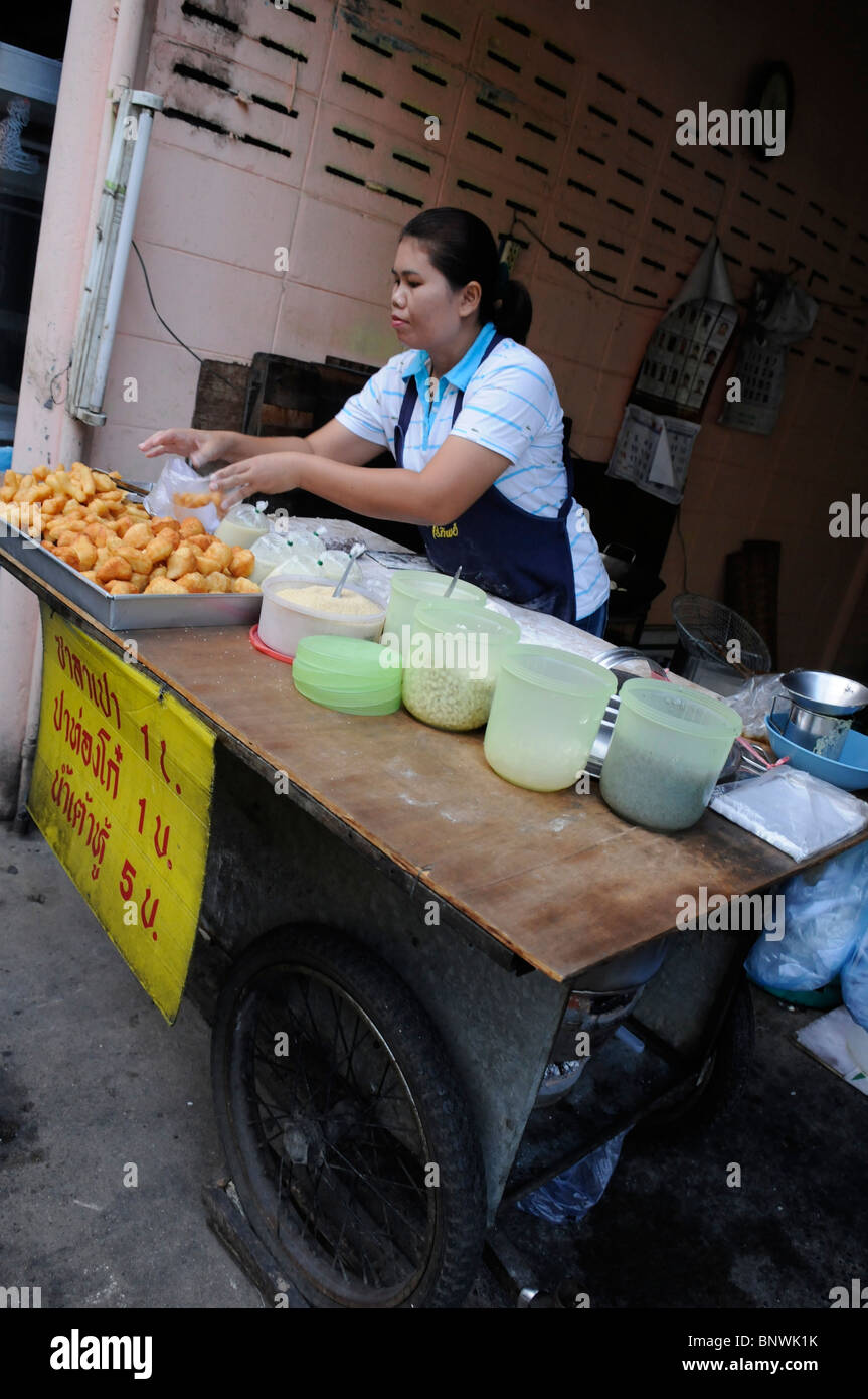 lady cooking thai style bread sticks , bangkok , thailand Stock Photo ...