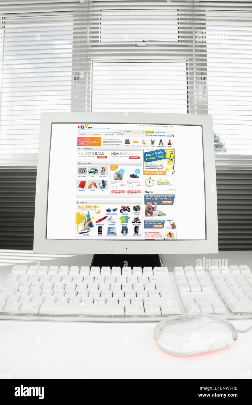 Home Computer with Ebay.co.uk Internet page on the screen Stock Photo ...