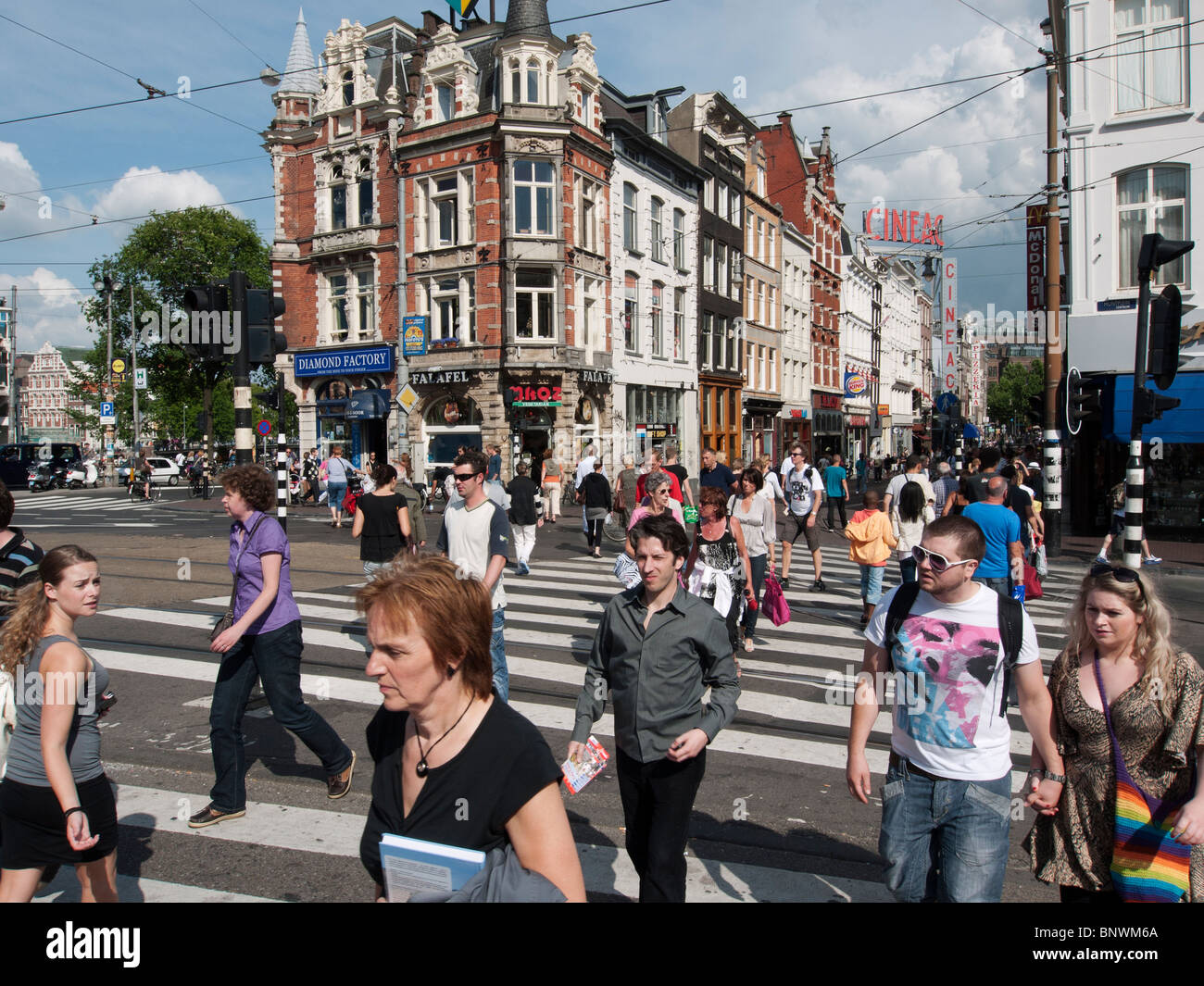 Busy pedestrian crossing in central Amsterdam The Netherlands Stock ...