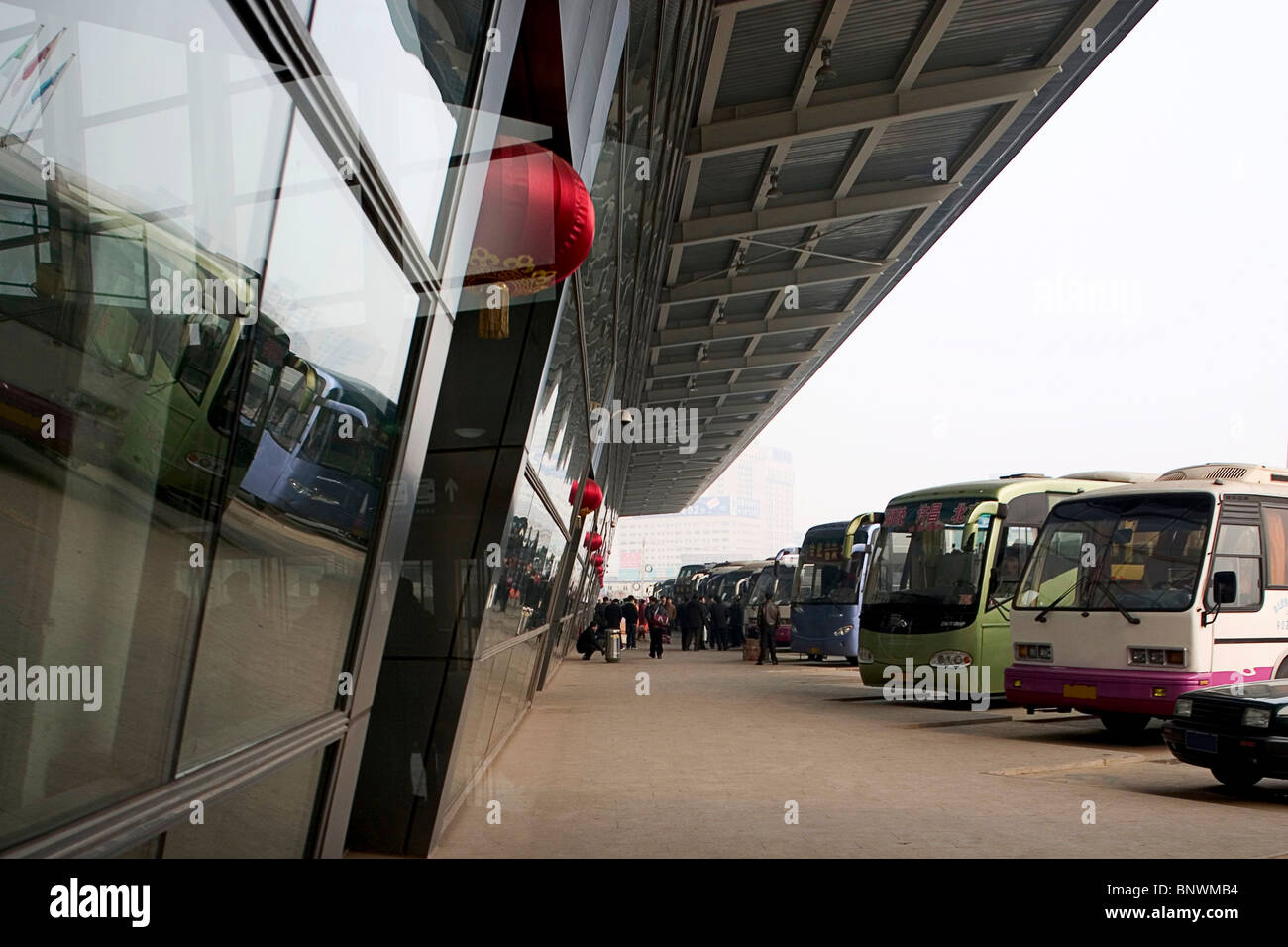 Coaches outside modern bus terminal in China Stock Photo - Alamy