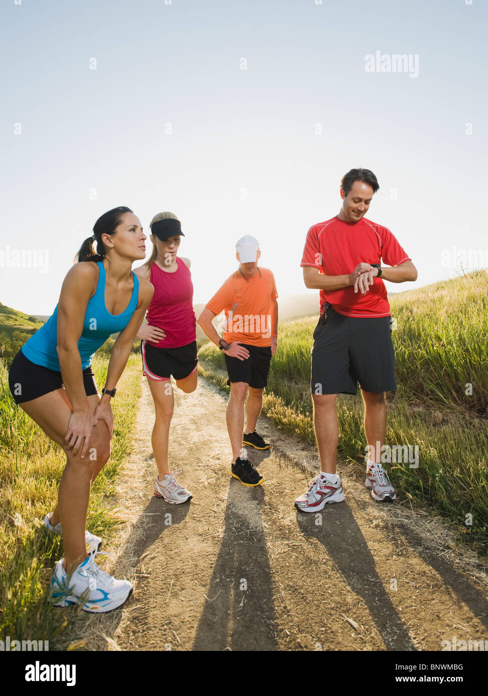 Trail runners taking a break Stock Photo - Alamy