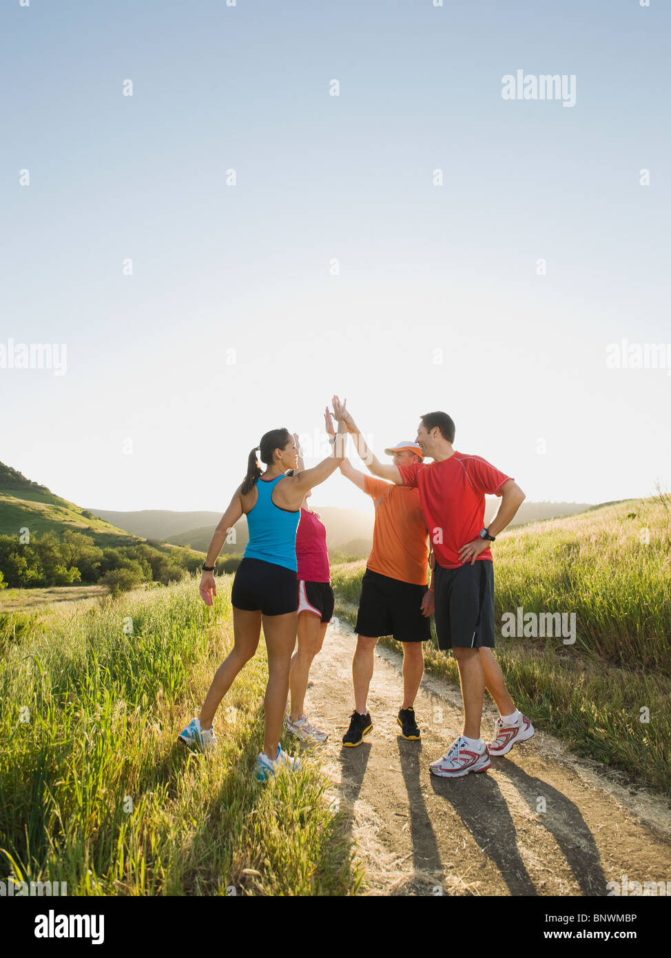 Trail runners taking a break Stock Photo - Alamy