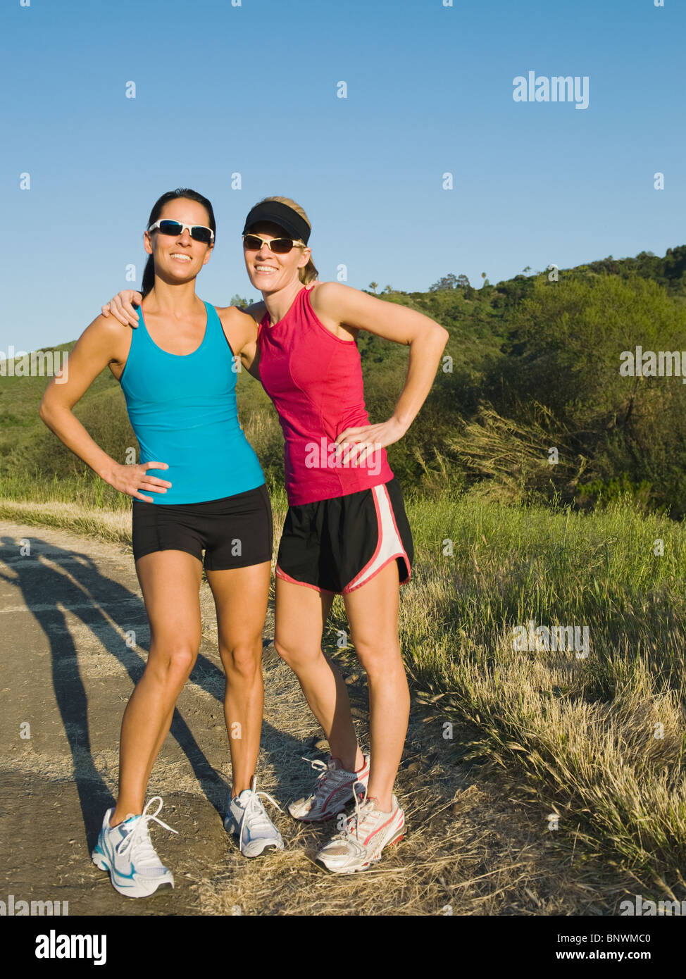 Two trail runners taking a break Stock Photo - Alamy