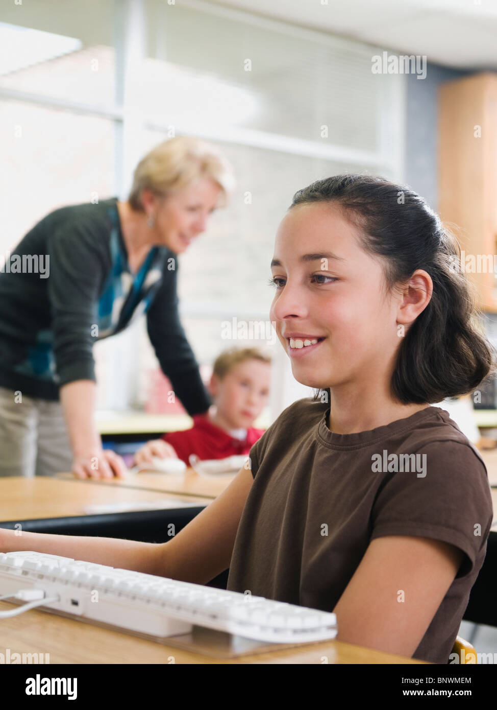 Students working on computers in classroom Stock Photo - Alamy