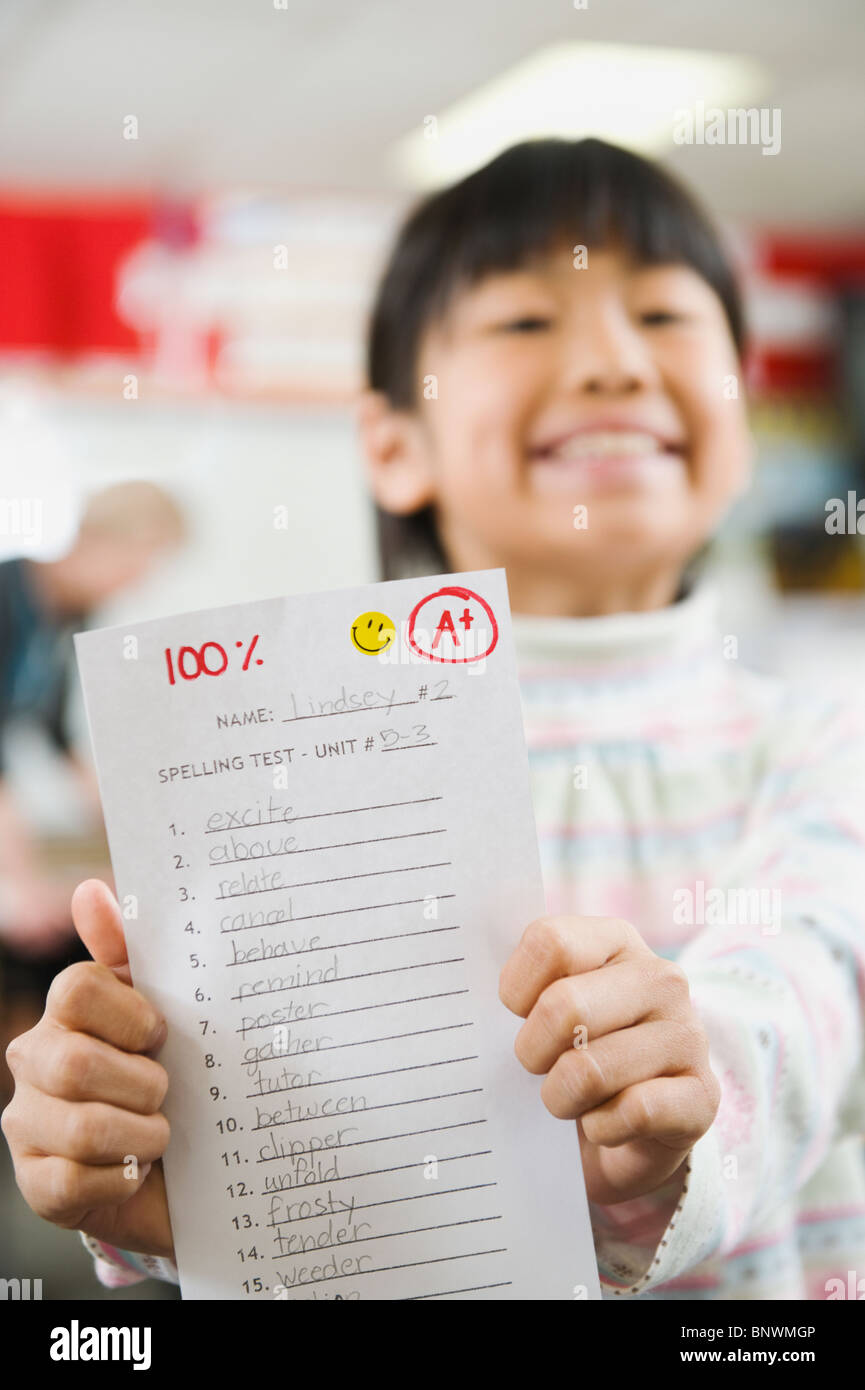 Happy paper grade student classroom hi-res stock photography and images ...