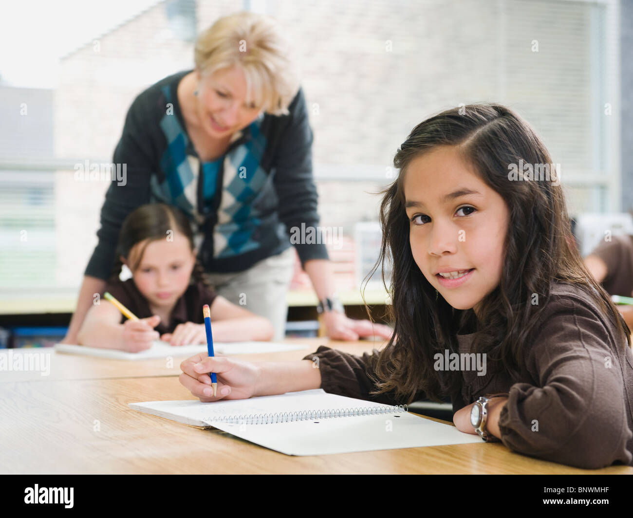 Indian adult woman teacher writing hi-res stock photography and images - Alamy