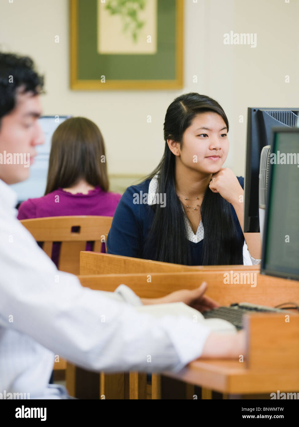 College students working in library Stock Photo - Alamy