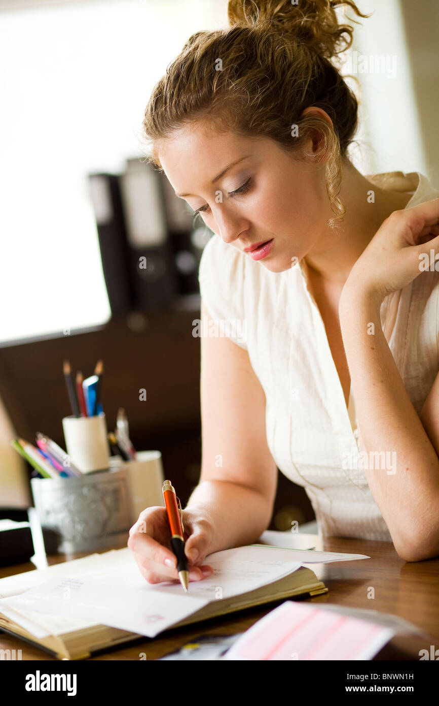 Woman in office Stock Photo - Alamy