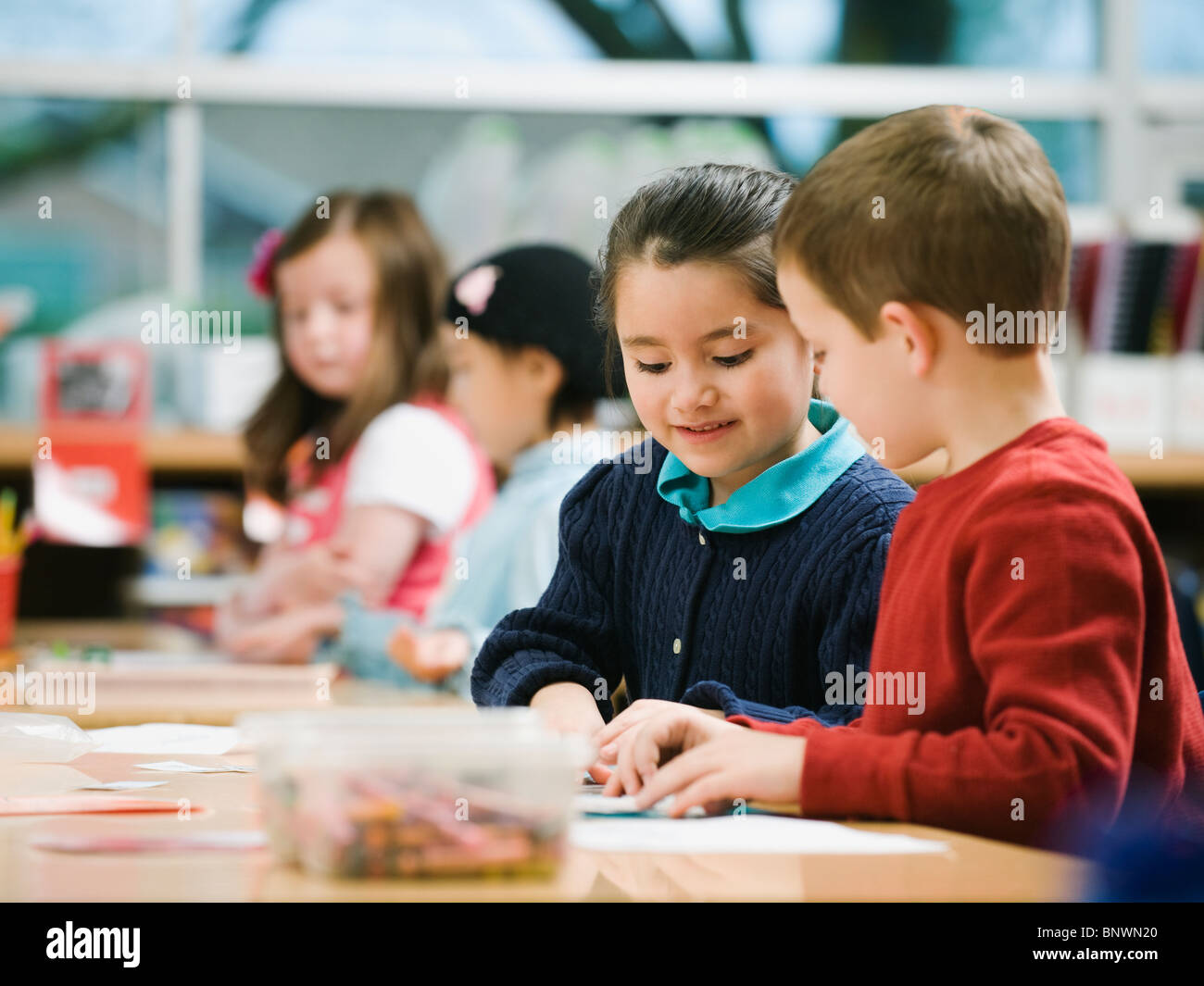 Kindergarten students in classroom Stock Photo - Alamy