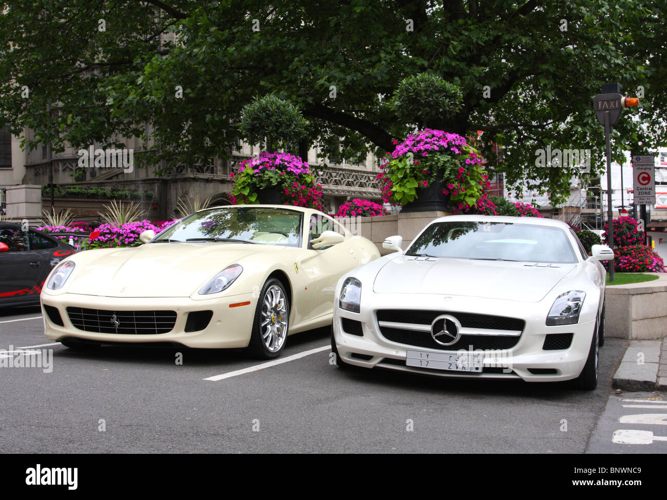 Ferrari and Mercedes cars on a London street Stock Photo - Alamy