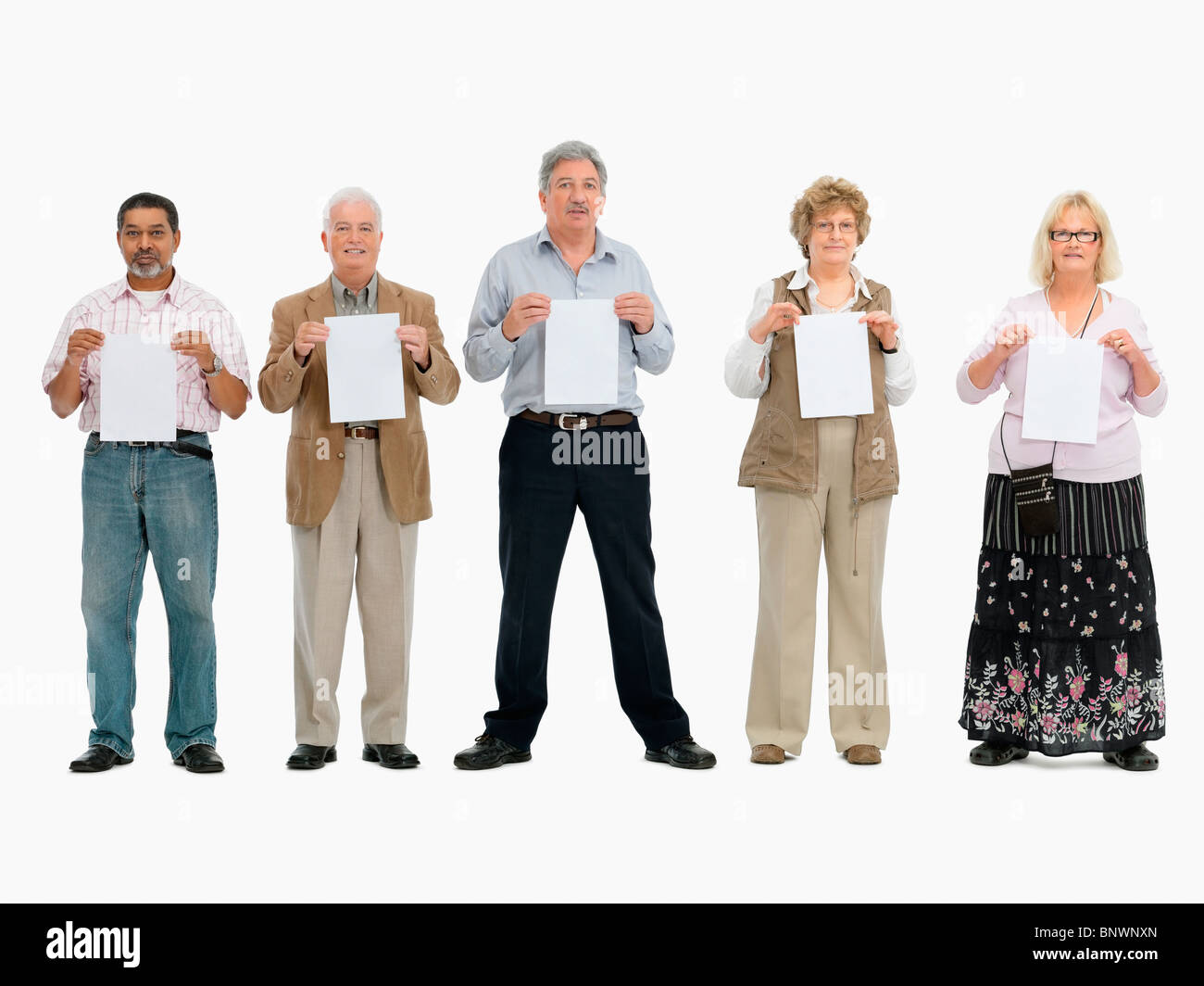 group of people standing in a row holding papers Stock Photo - Alamy