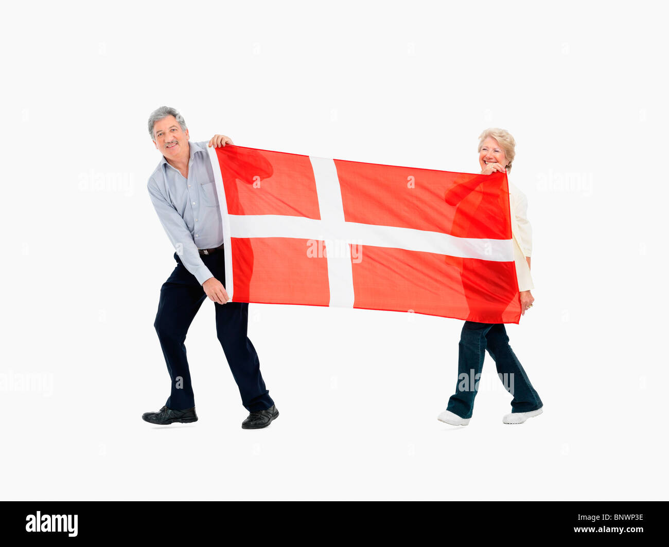 two people carry the Danish flag Stock Photo - Alamy