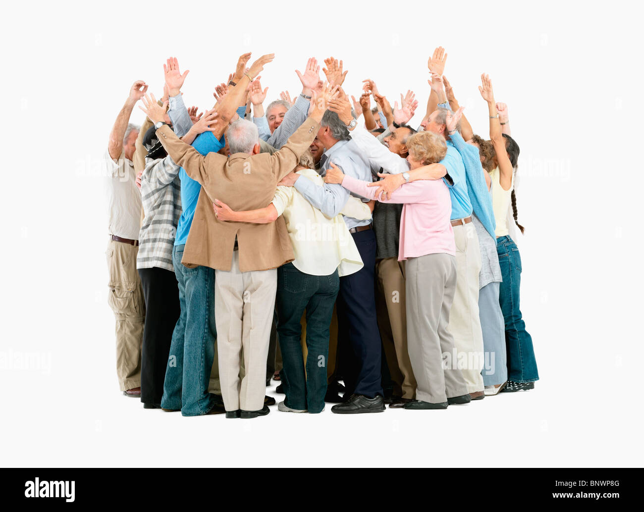 A group of people hugging and raising their arms Stock Photo - Alamy
