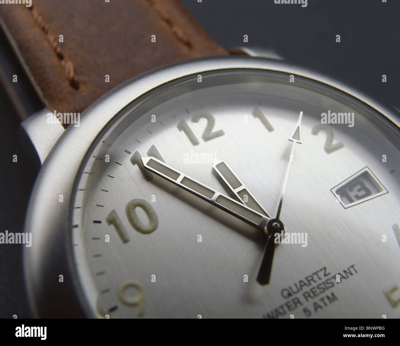 The arm watch with the leather strap Stock Photo - Alamy