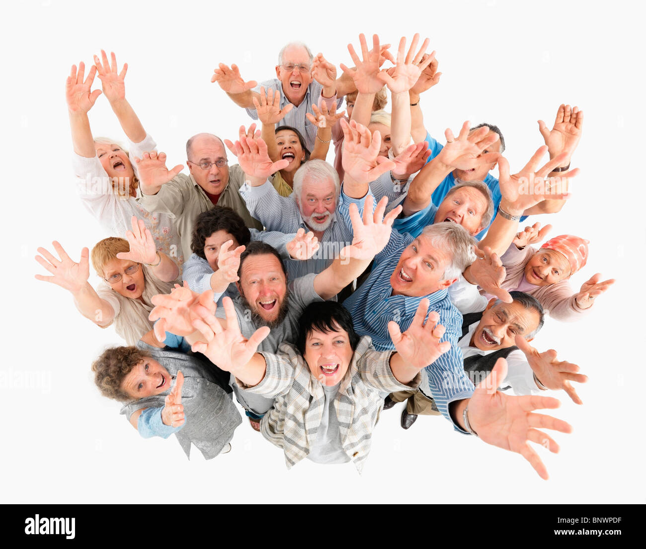 A group of people waving with their arms raised Stock Photo - Alamy