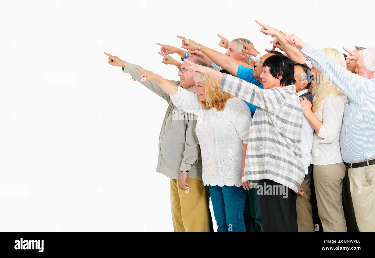 A group of people pointing Stock Photo - Alamy