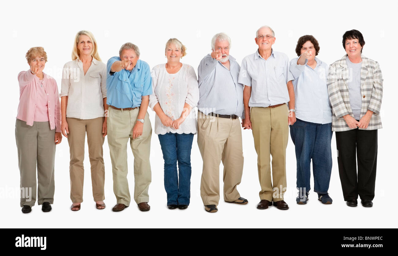 A group of people standing in a row Stock Photo - Alamy