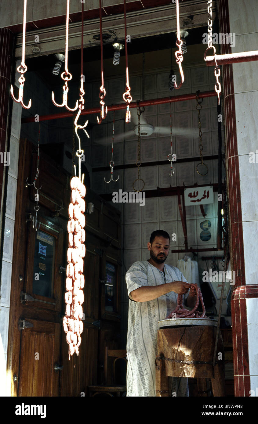 Local butcher making sausages by hand in the souks of Alexandria in ...