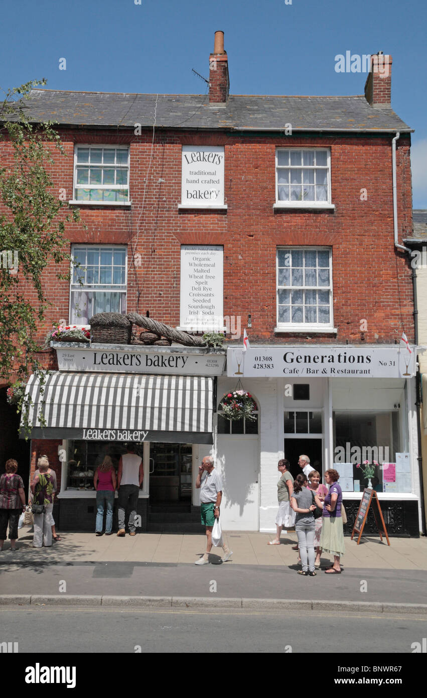 View of a pair of typical high street shops in Bridport, Dorset, UK ...