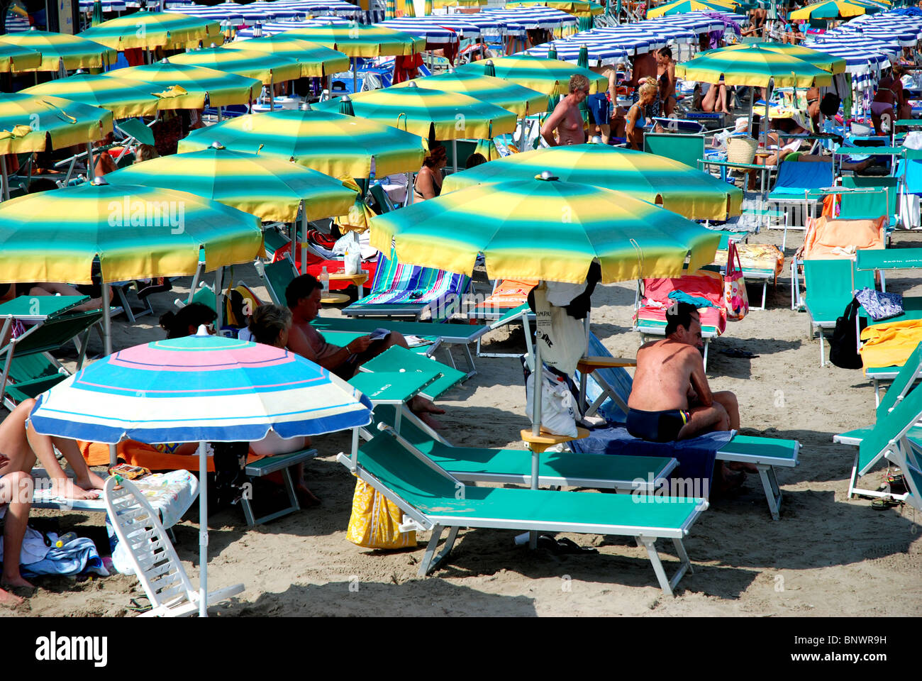 Sunbathing on sunbeds hi-res stock photography and images - Alamy