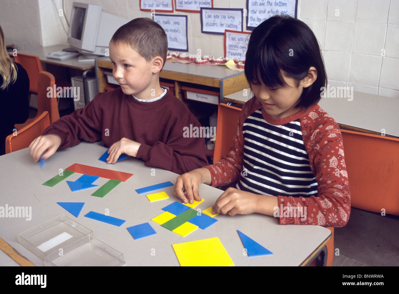 primary school children working with shapes Stock Photo - Alamy