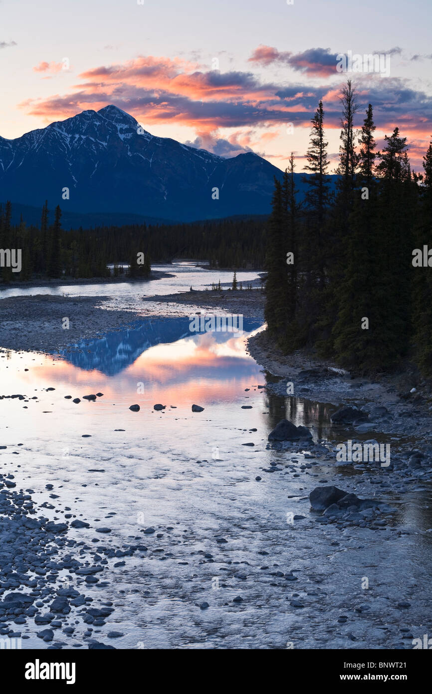 Pyramind Mountain 2766m reflected on Anthabasca River at twilight ...