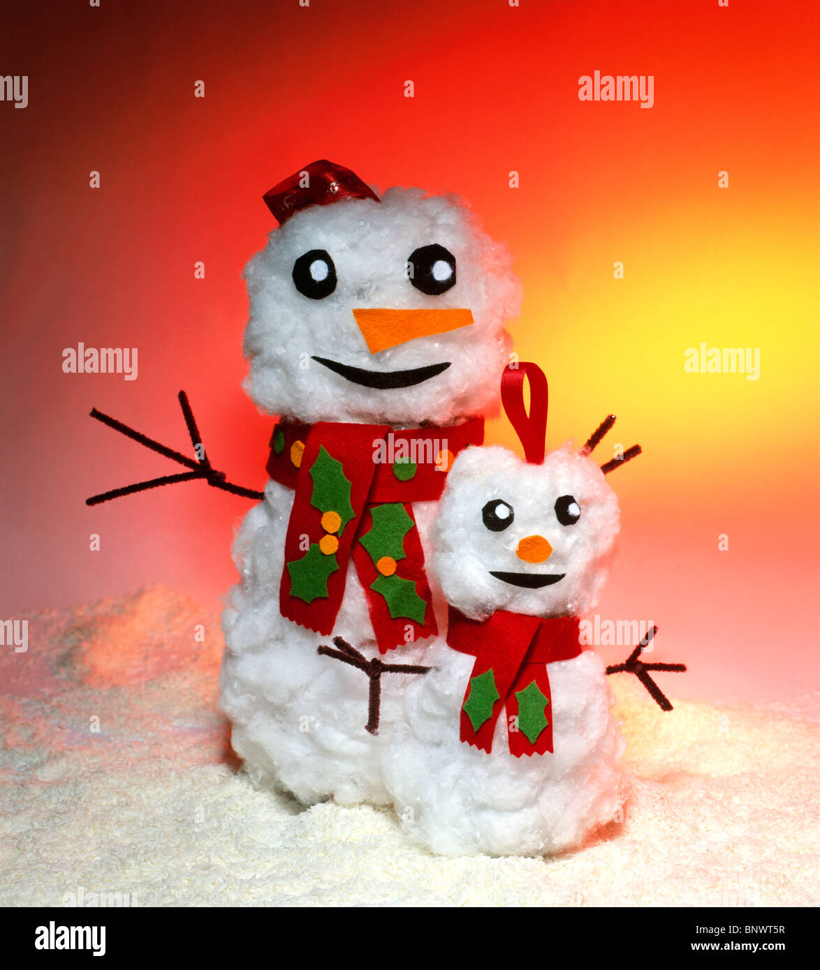 Two snowman toys Stock Photo - Alamy
