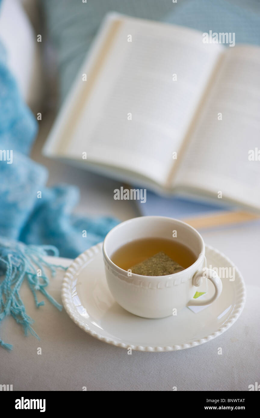 Cup of tea and a book Stock Photo - Alamy