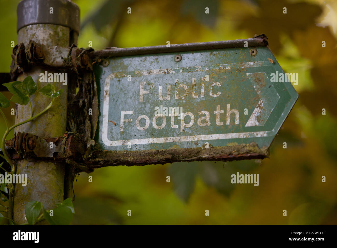 An old, rusty Public Footpath Sign in the English countryside Stock ...