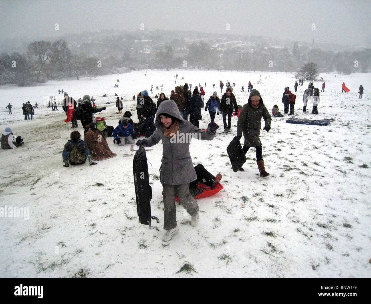 People at Hampstead Heath after a snow fall Stock Photo - Alamy