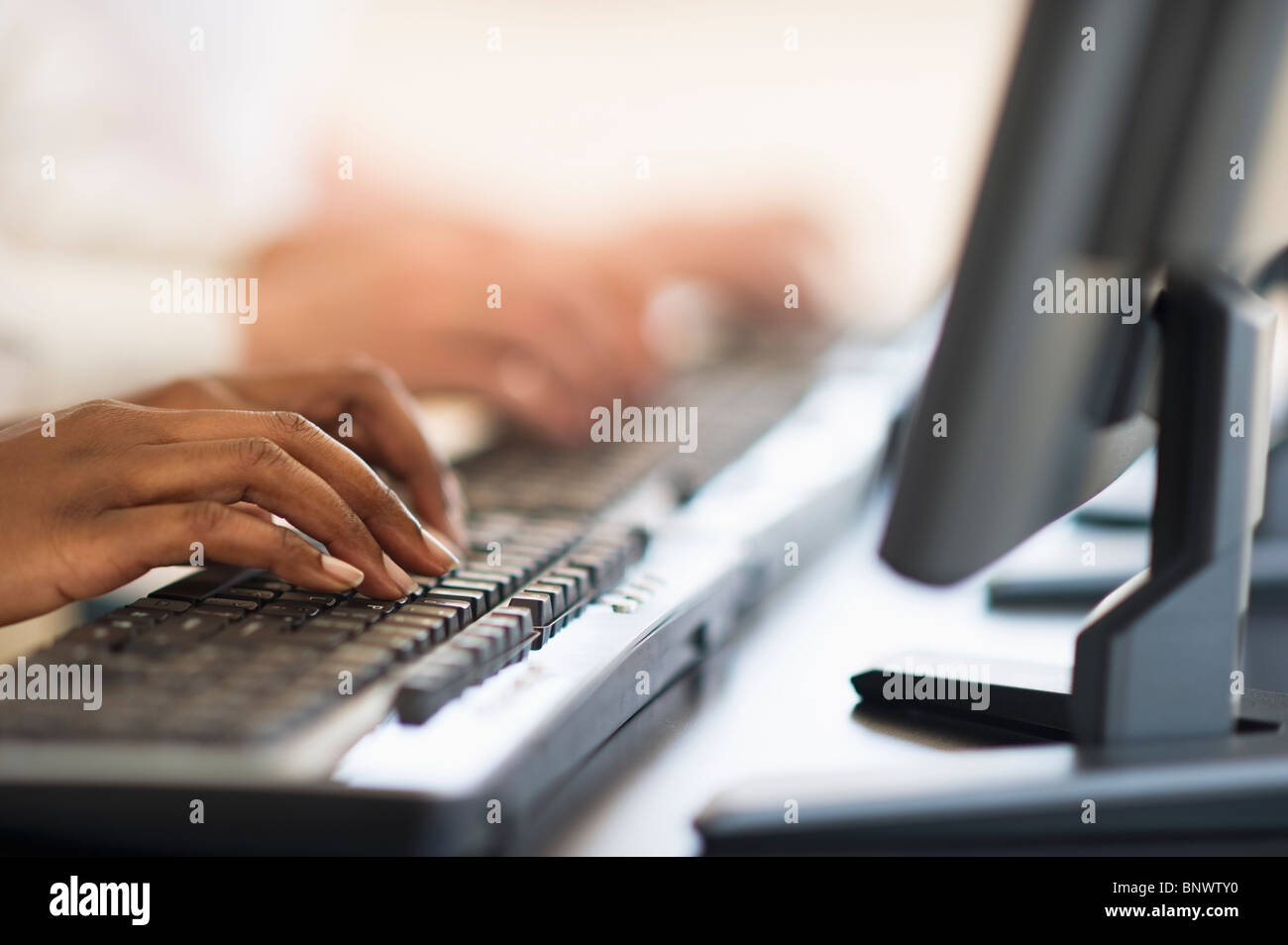 Employees working at computers Stock Photo - Alamy