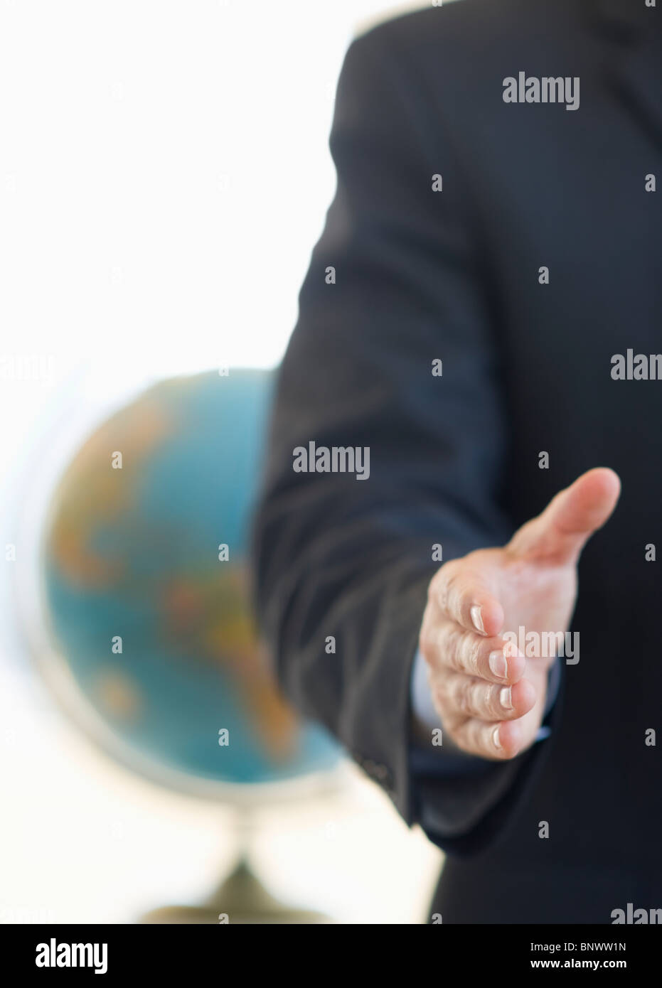 Hand extended for handshake Stock Photo - Alamy