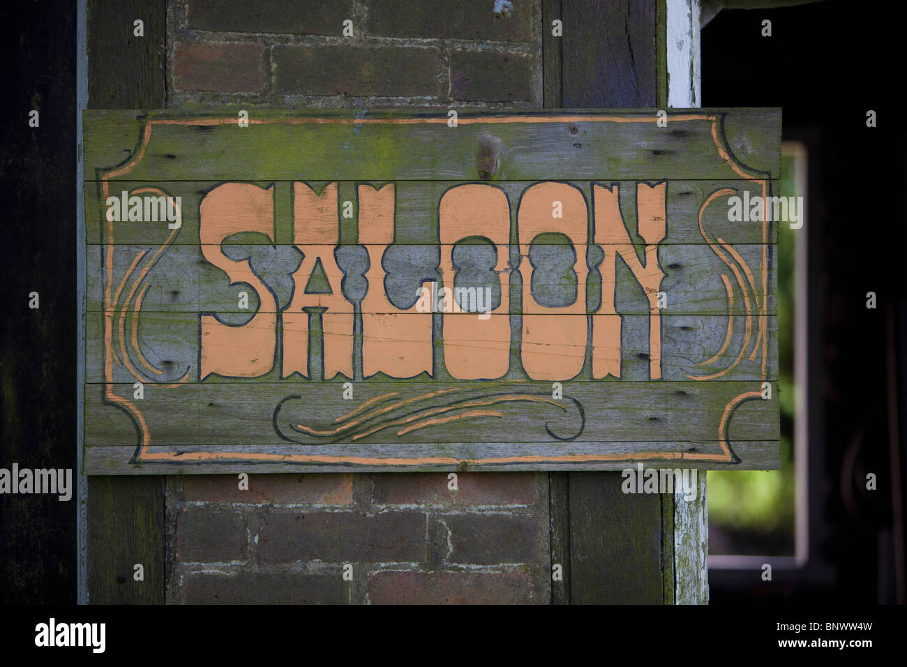 Old fashioned "Saloon" sign Stock Photo - Alamy