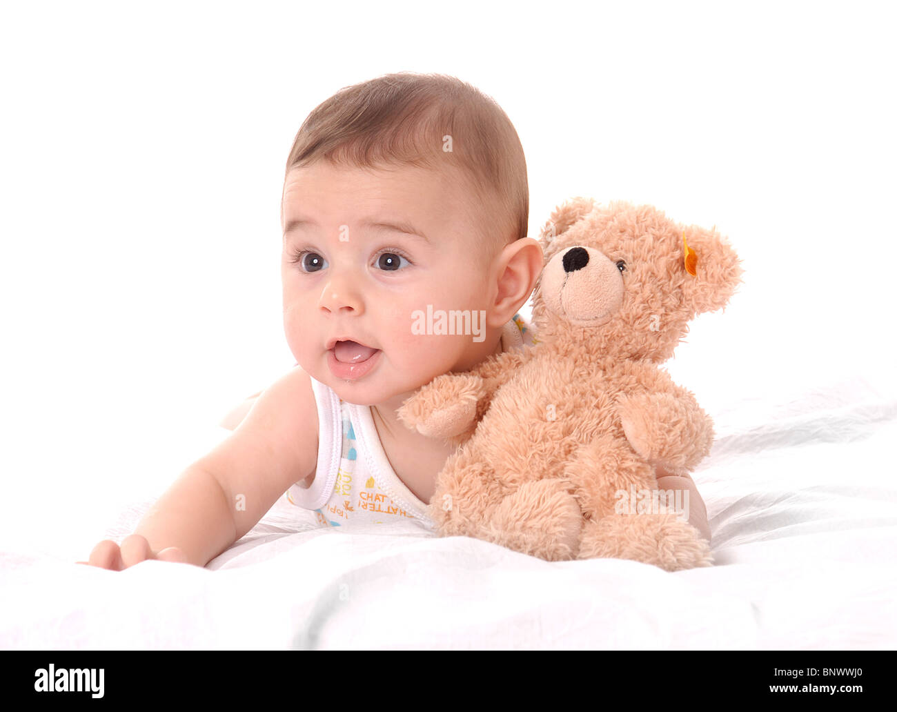 baby boy playing with teddy bear cutout high key Stock Photo - Alamy