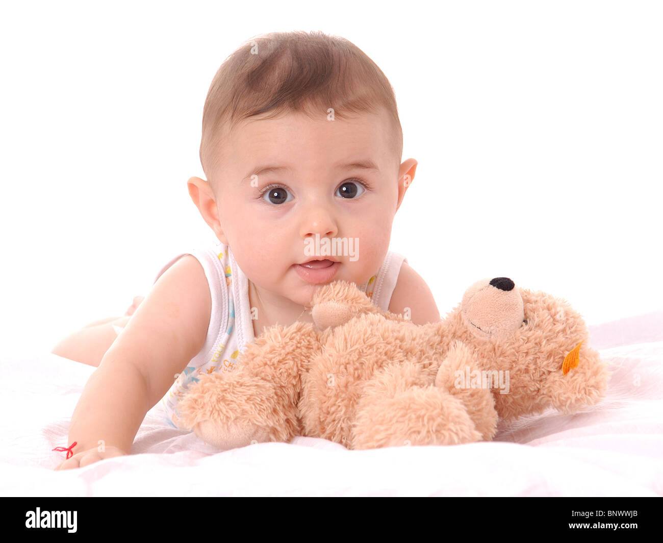 baby boy playing with teddy bear,cutout,high key Stock Photo - Alamy