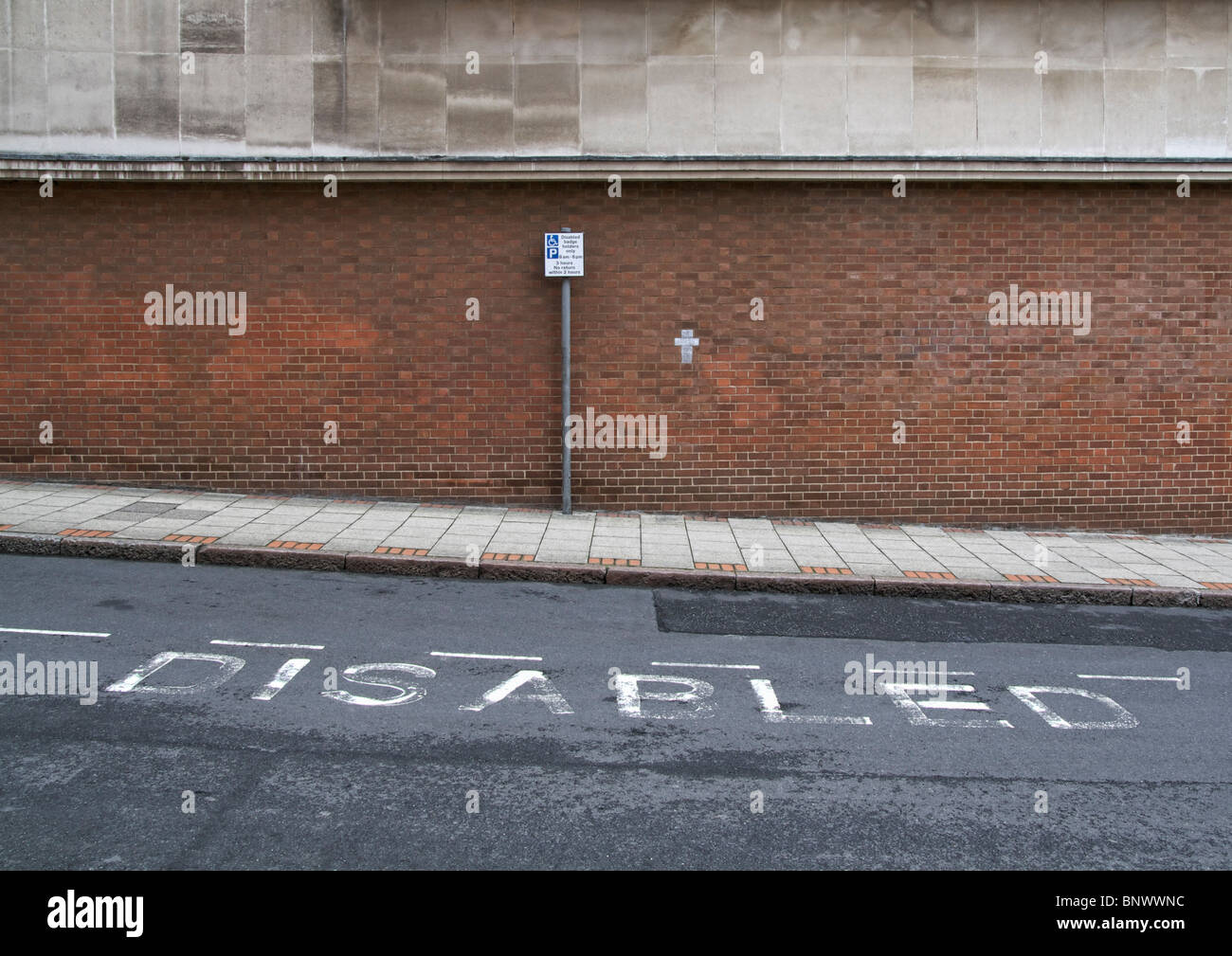 Disabled parking bay hi-res stock photography and images - Alamy