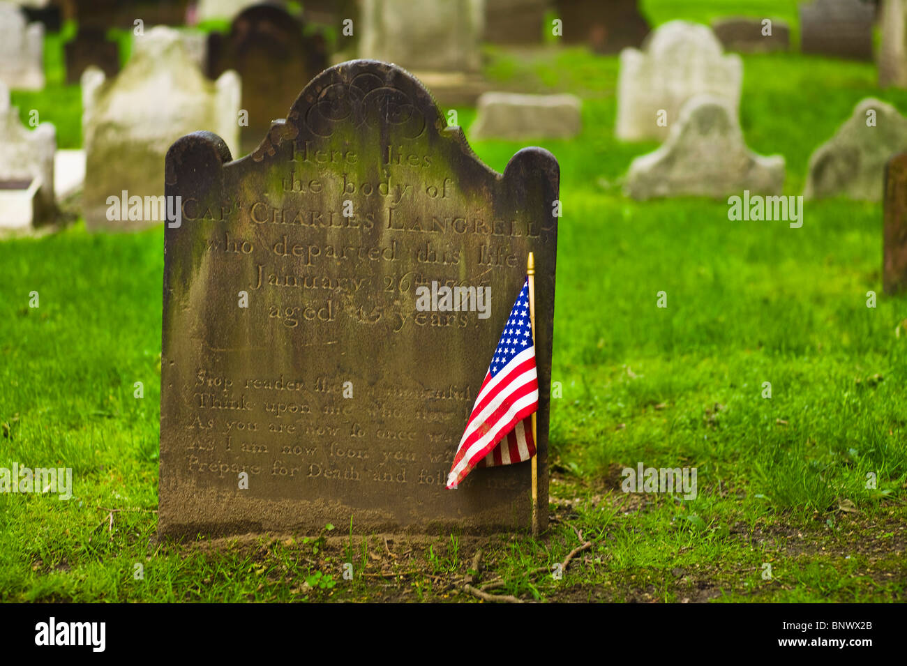 American flag in front of tombstone Stock Photo - Alamy