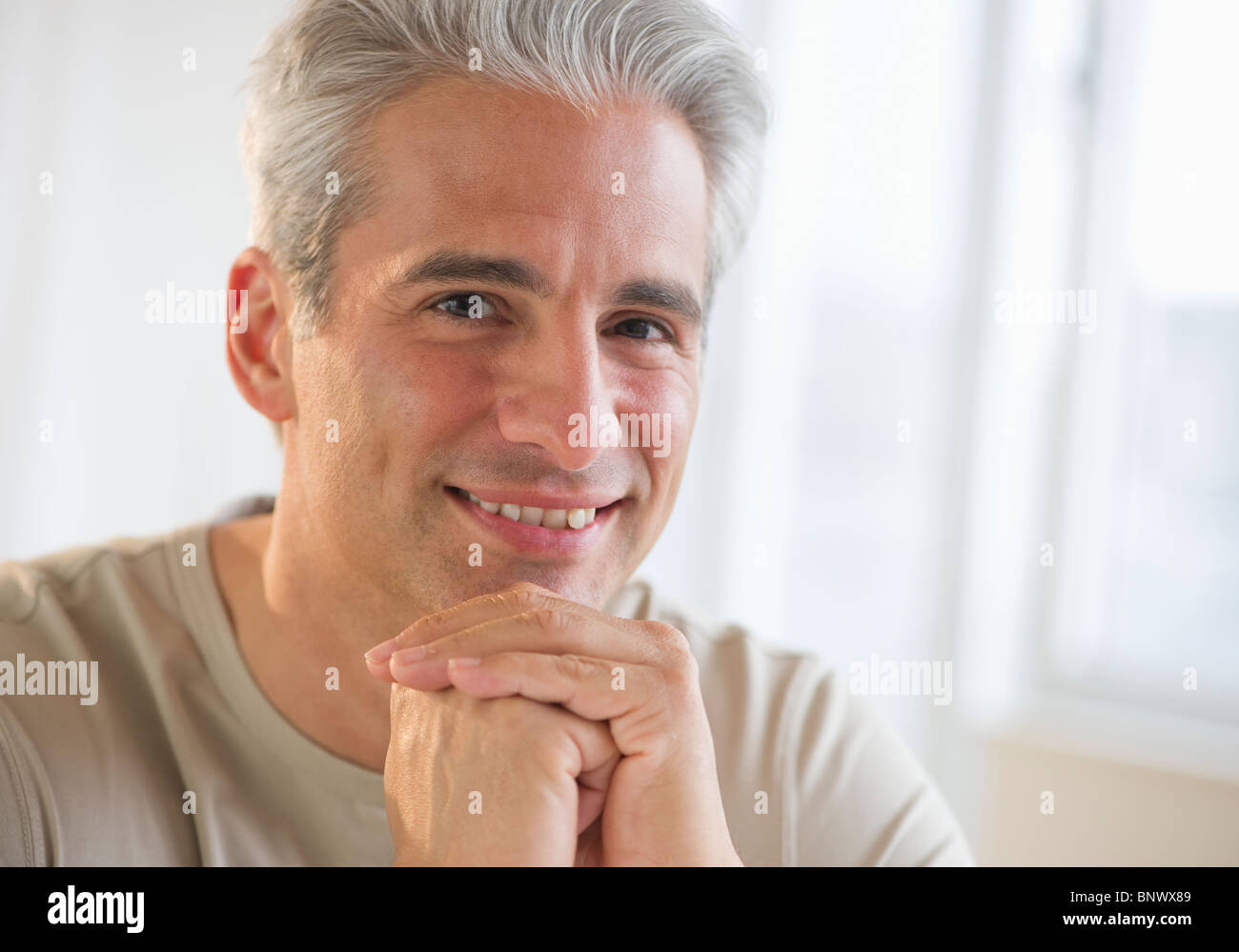 Portrait of a grey haired man Stock Photo - Alamy