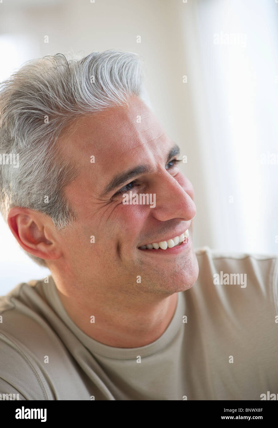 Portrait of a grey haired man Stock Photo - Alamy