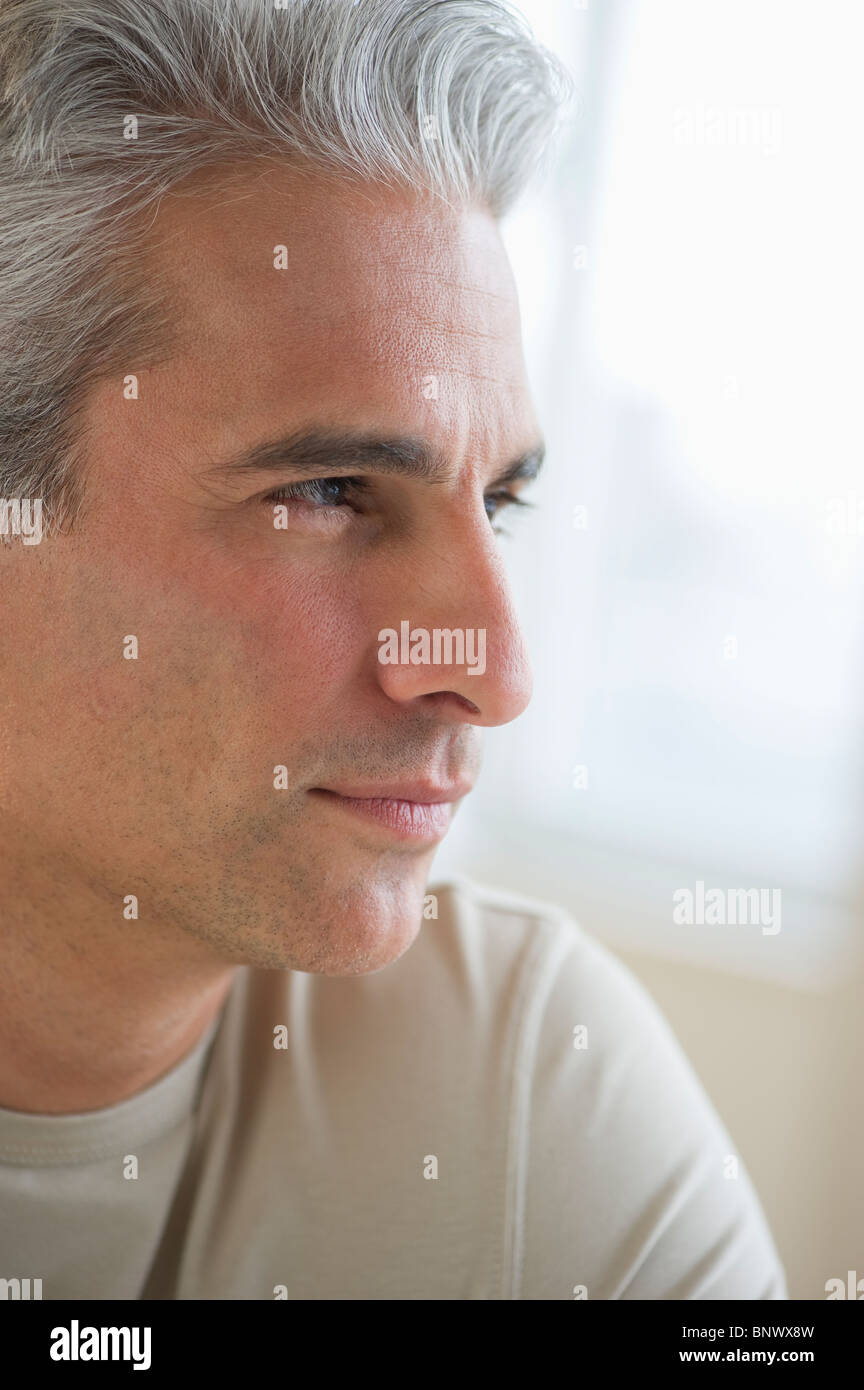 Portrait of a grey haired man Stock Photo - Alamy